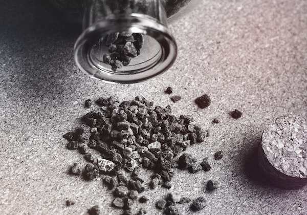 How does H2SO4 dissociate in water?