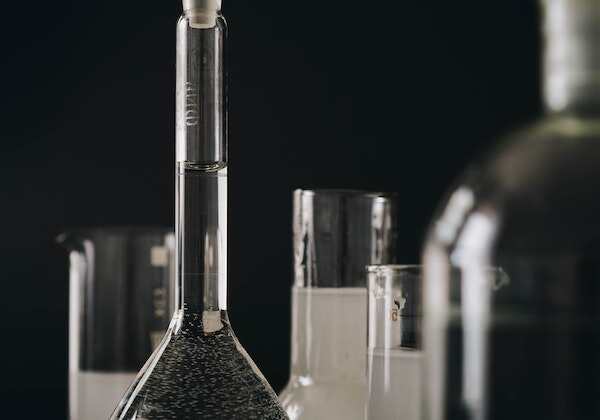 How does H2SO4 dissociate in water?